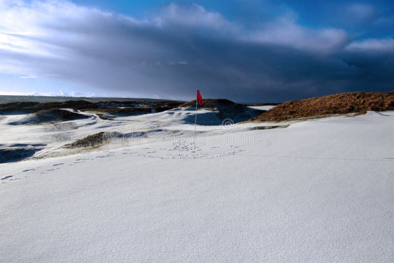 Snow Covered Links Golf Course Red Flag in Storm Stock Photo - Image of ...