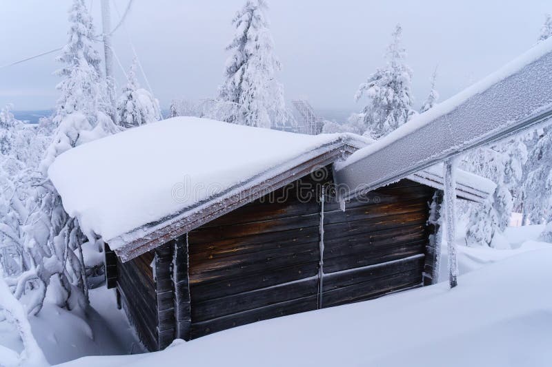 Snow covered log cabin stock image. Image of winter - 304280579
