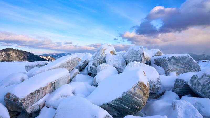 Snow Covered Marble Blocks stock image. Image of winter - 204931887