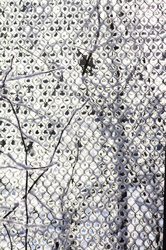 Snow covered a metal grid stock photo. Image of fences - 12686674