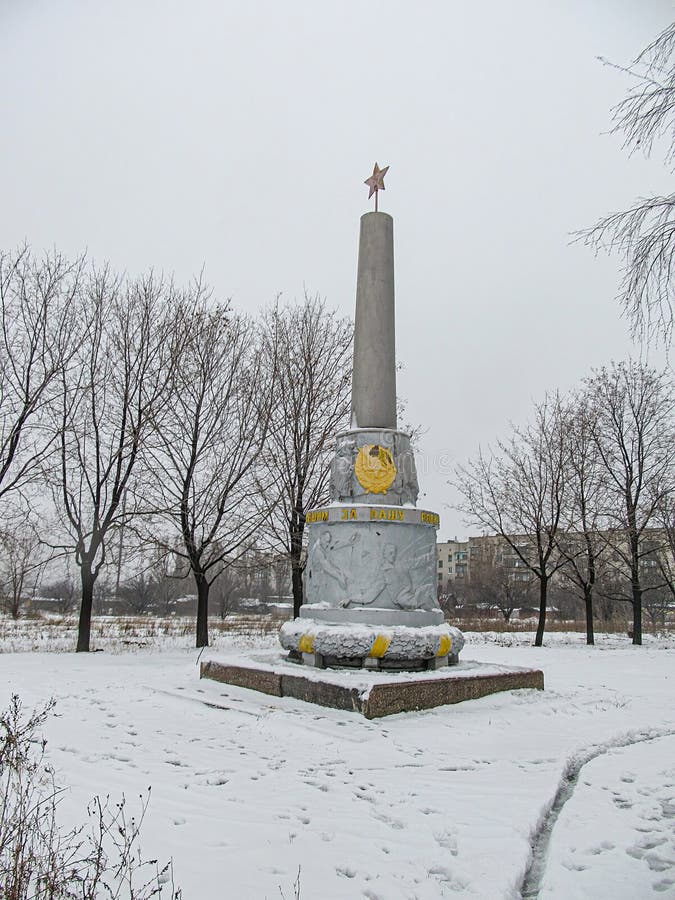 A Snow-covered Monument, Possibly Historical or Commemorative, with a ...