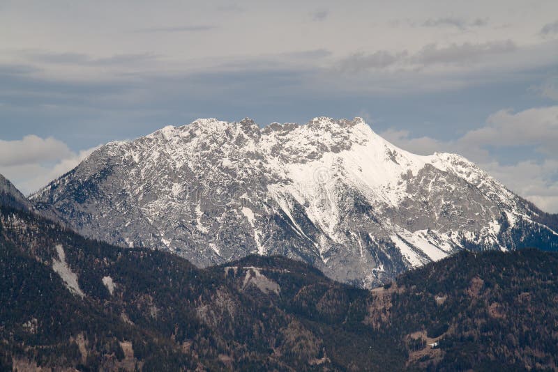 Snow-covered mountain stock photo. Image of alpine, snowline - 67764880