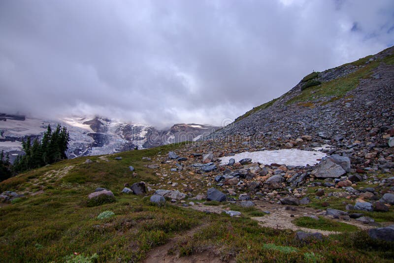 Snow Covered Mountain Meadow with Overcast Sky Stock Photo - Image of ...