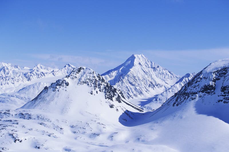 Snow-covered Mountain Range Stock Image - Image of desolate, mountains ...