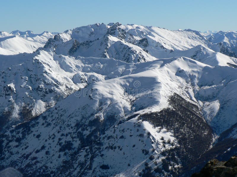 Snow-covered mountain top stock photo. Image of mountain - 1031182