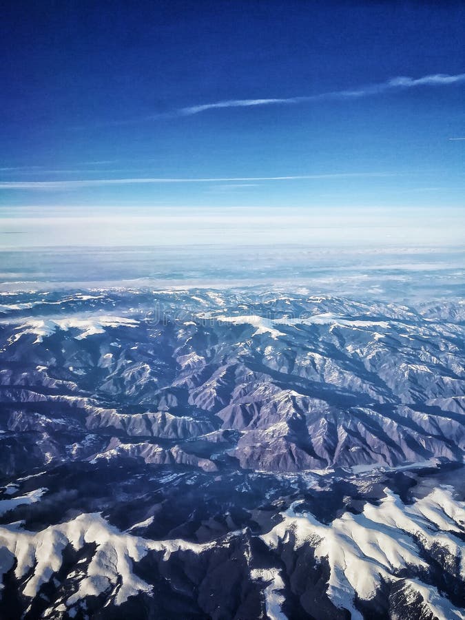 Snow Covered Mountains Airplane View Stock Photo - Image of flight ...