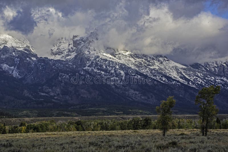 Snow Covered Mountains of the Grand Tetons. Stock Image - Image of ...