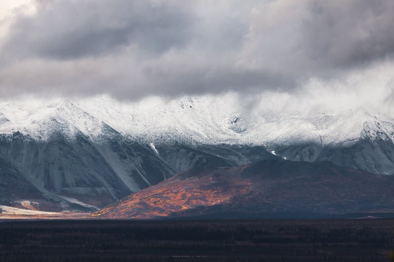 Snow Covered Mountains with Low Level Clouds in Alaska Stock Photo ...