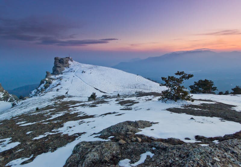 Snow-covered Mountains and Rocks at Purple Sunset Stock Photo - Image ...