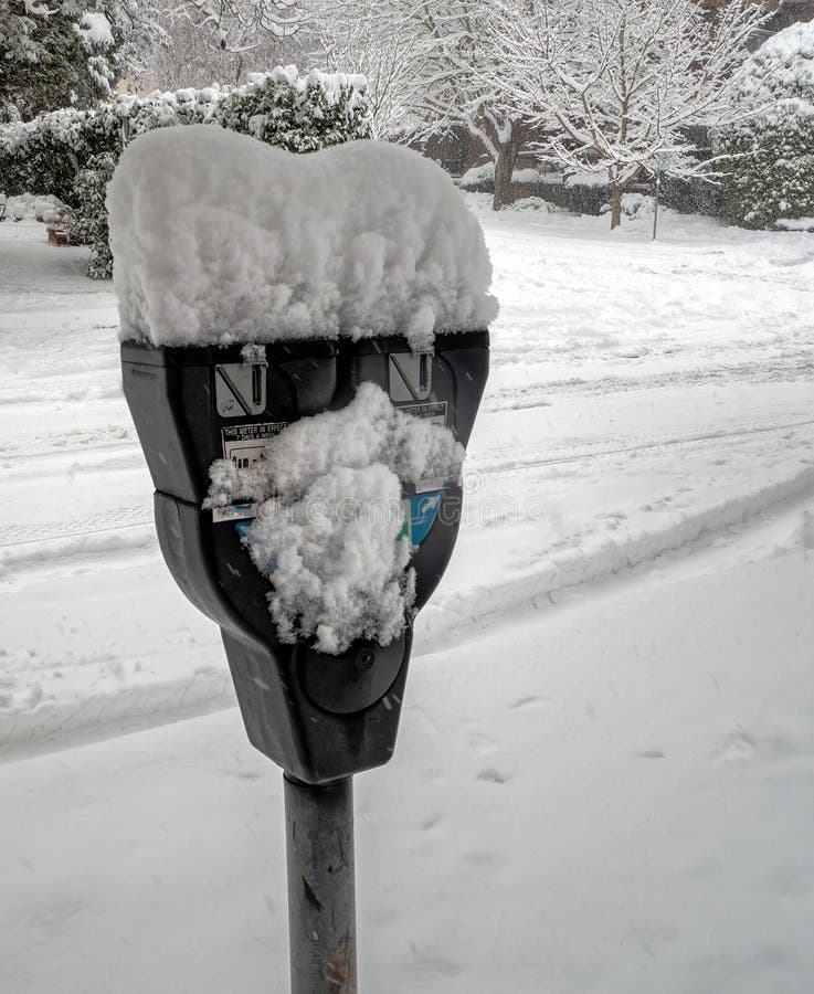 Snow Covered Parking Meter Resembles Face Stock Image - Image of ...