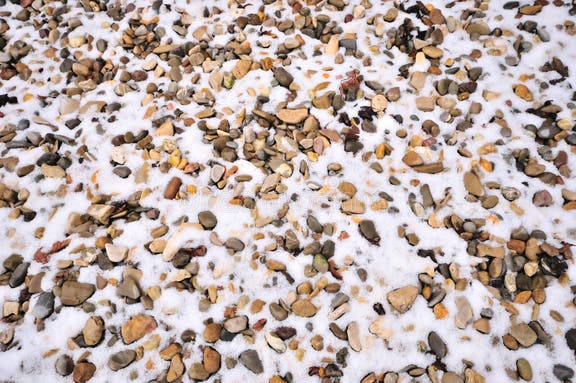 Snow-covered pebbles stock photo. Image of color, backgrounds - 18674382