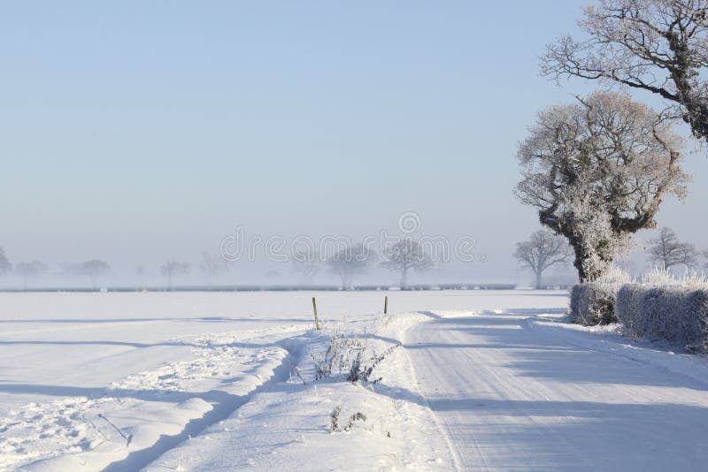 Snow covered road stock image. Image of england, hedgerows - 17341289
