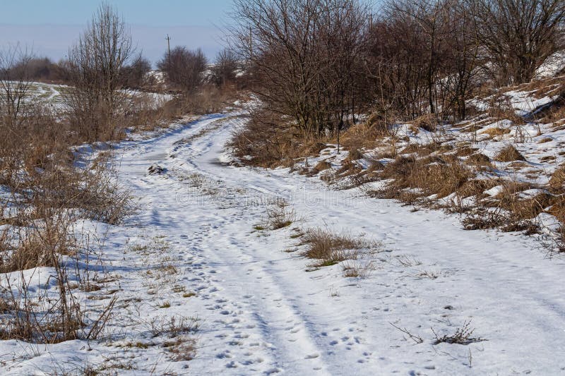 Snow-covered Road, the Marks of Wheels Stock Image - Image of peaceful ...