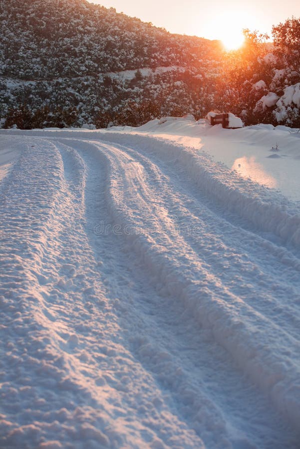 Snow covered road stock image. Image of dusk, dawn, north - 91254555