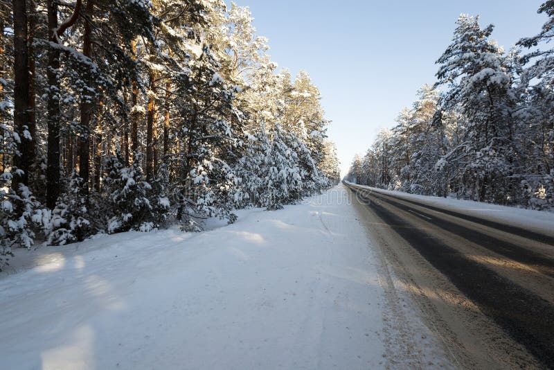 Snow covered road stock photo. Image of road, snowing - 69026226