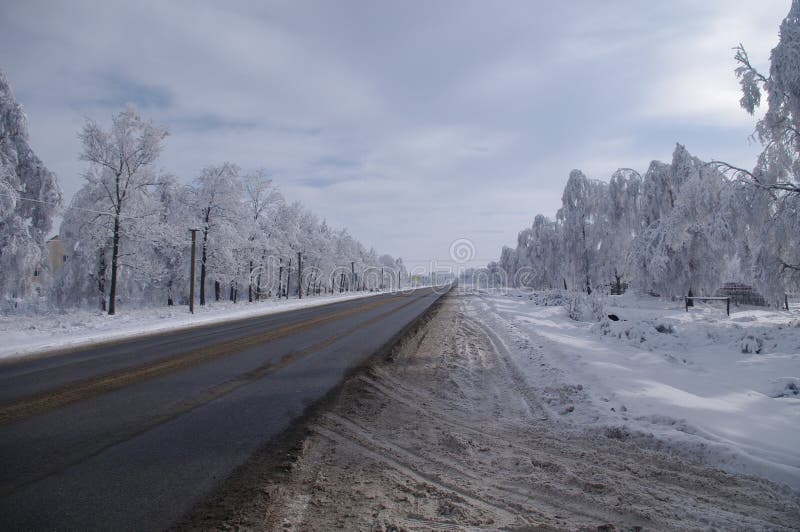 Snow-covered road stock photo. Image of snow, cold, winter - 60302502