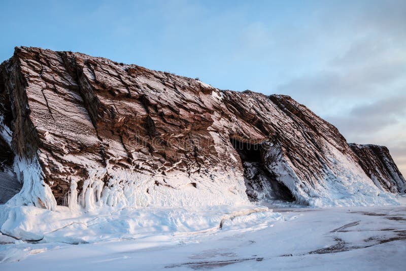 Snow-covered Rock with Grotto Stock Image - Image of landscape, block ...
