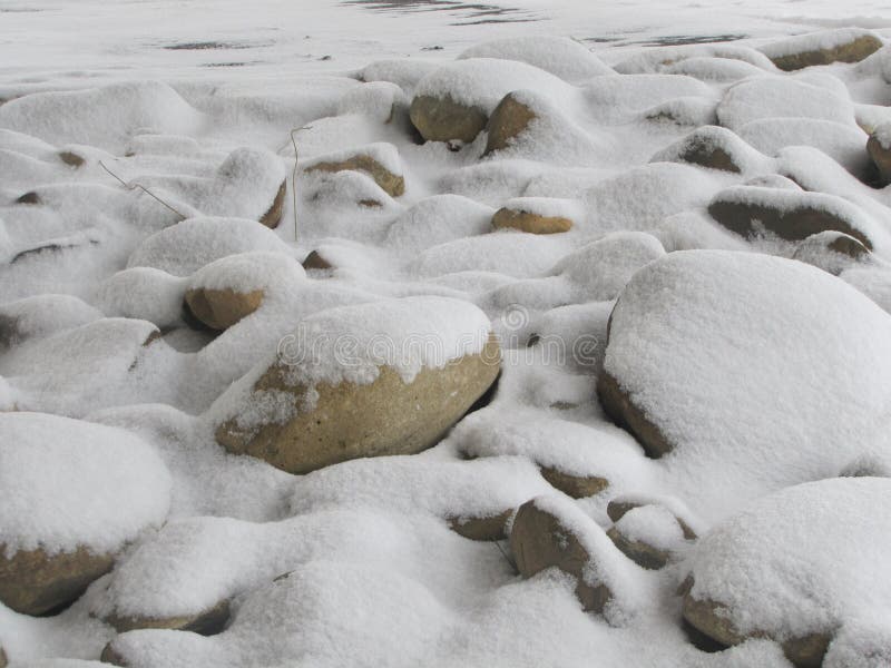 Snow-covered Rocks Beneath Freeway Stock Photo - Image of ...