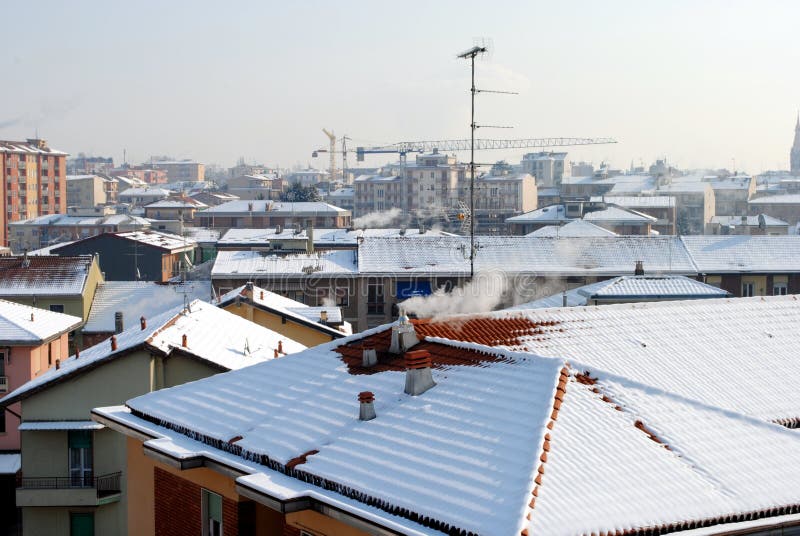 Snow covered rooftops stock image. Image of urban, cold - 23285927