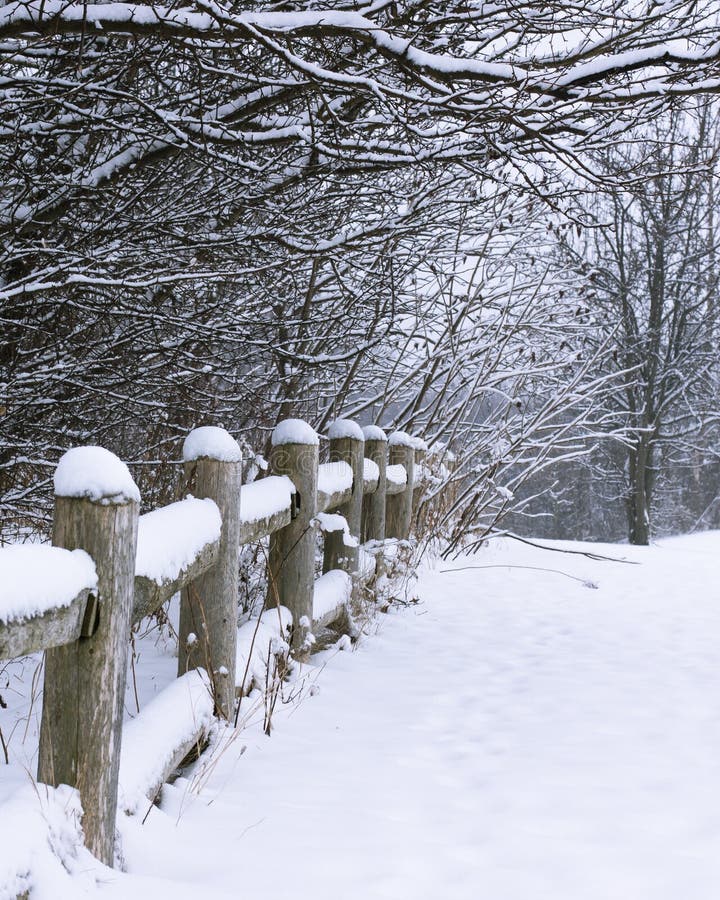 Snow Covered Rustic Fence stock image. Image of fence - 29116695