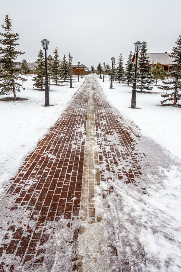 Snow covered sidewalk stock photo. Image of path, frozen - 179481648