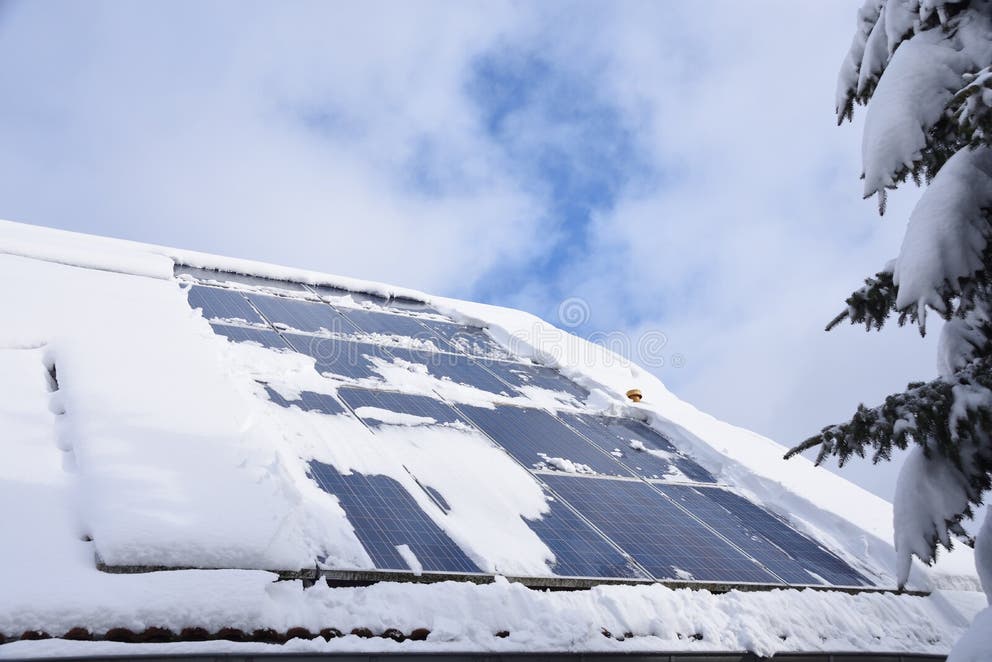 Snow-covered solar system stock image. Image of system - 149788693