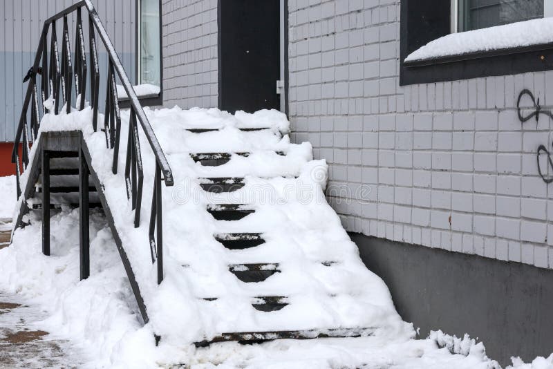 . Snow-covered Stairs at the Entrance of the Building Stock Image ...