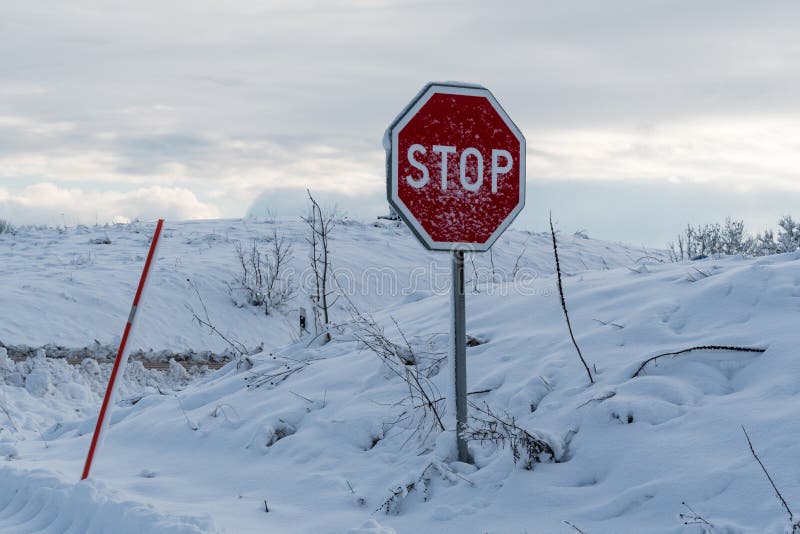 Snow covered stop sign stock photo. Image of snow, winter - 108336642