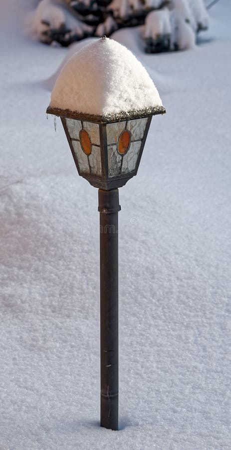 Snow Covered Street Lamp stock photo. Image of metal - 65828224