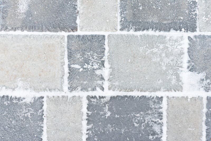 Snow on Tile Background. Closeup Photograph of Melting Snow on a ...