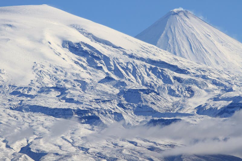 The Snow-covered Top of a Volcano Stock Photo - Image of transcendental ...