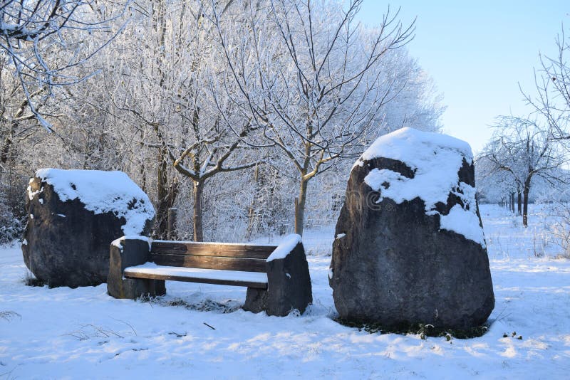 Snow Covered Volcano Stone Park Bench Stock Image - Image of freezing ...