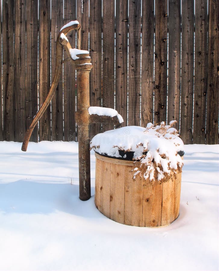 Snow Covered Water Well stock image. Image of pine, heap - 28516333