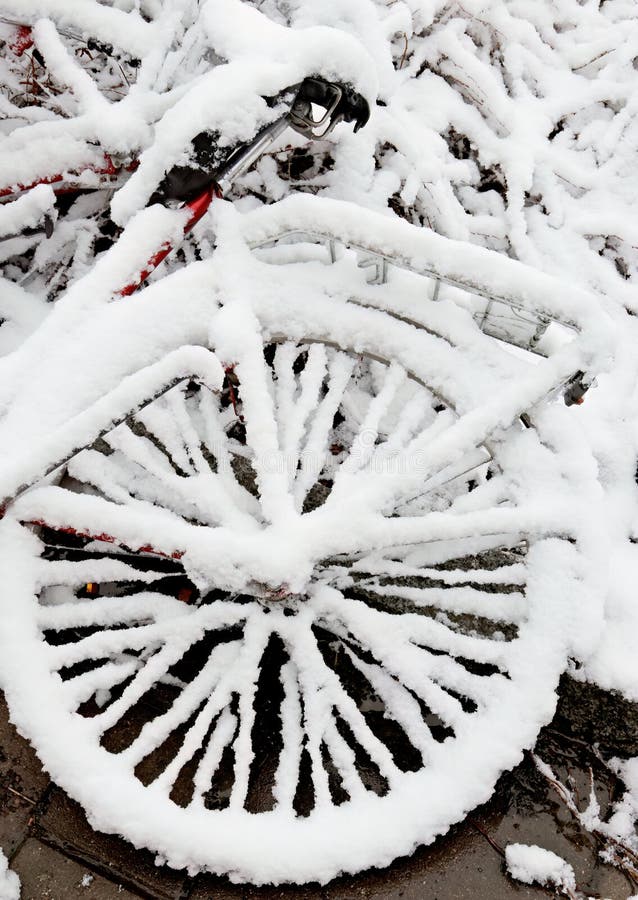 Snow Covered Wheel of an Abandoned Bicycle Stock Photo - Image of ...