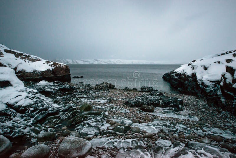 Snow-covered Coast of the Arctic Ocean, with Lapping Waves on Large ...