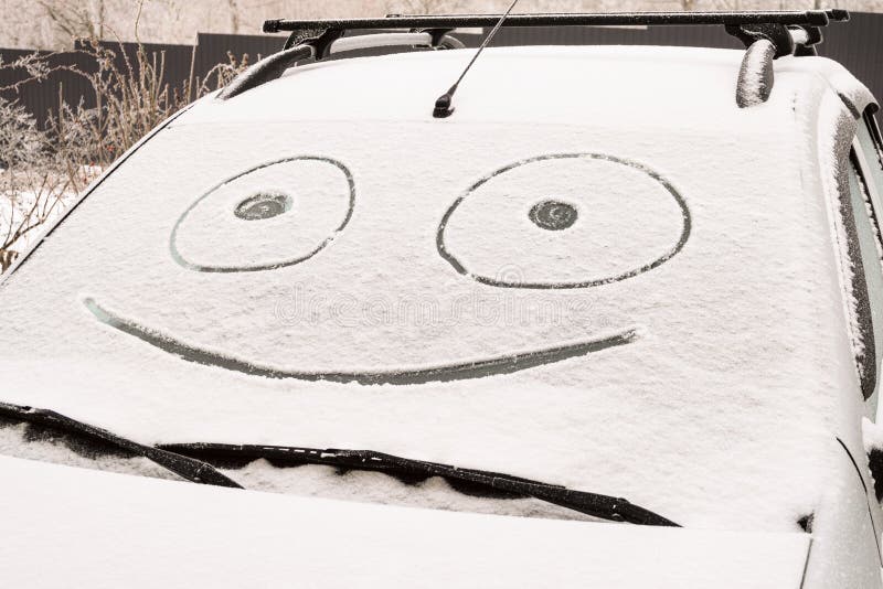 Snow Covered Windshield with Drawn Smile Face Stock Image - Image of ...