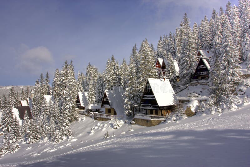 Snow Covered Winter Ski Center Stock Photo - Image of covered, cottage ...