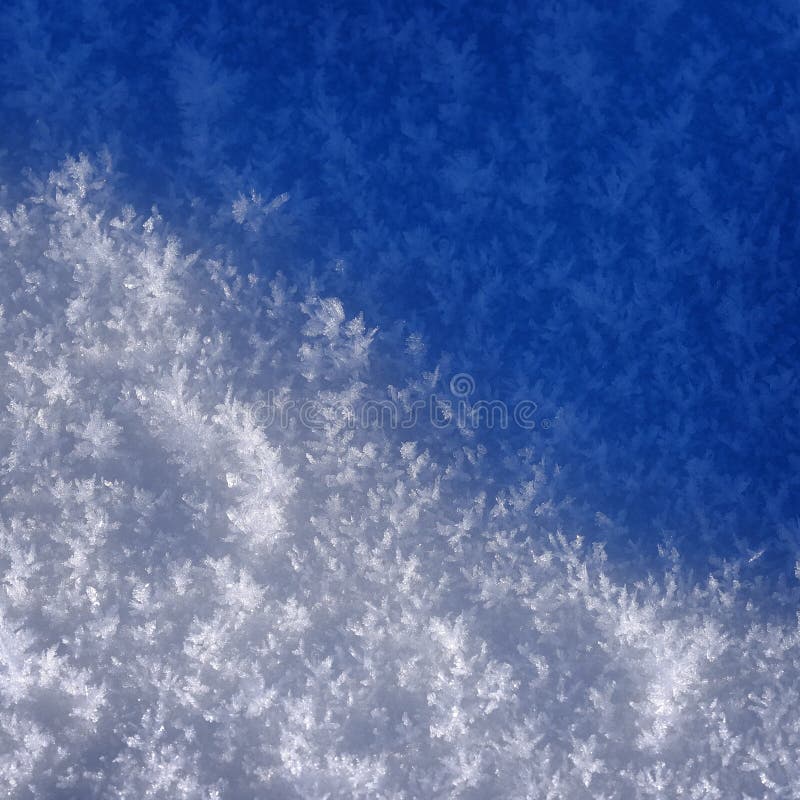Snow Crystals from Freezing with Blue Shadows and Textures Stock Photo ...
