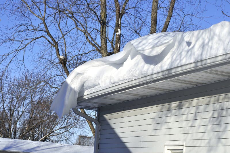 Snow drift on roof stock photo. Image of snow, season - 36530480