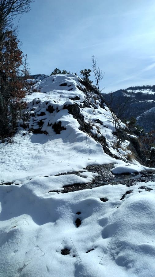 Snow on edge stock image. Image of plateau, summit, snow - 187164071