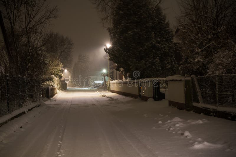 Empty Street at Night with Snowfall Stock Photo - Image of snowfall ...