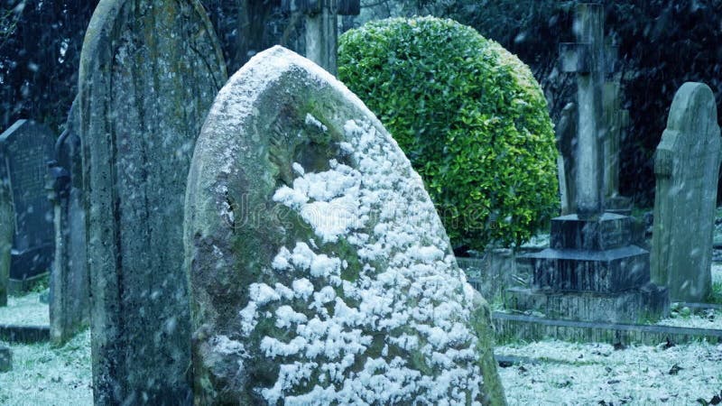 Pan Across Graves in Snowfall Stock Footage - Video of ground ...
