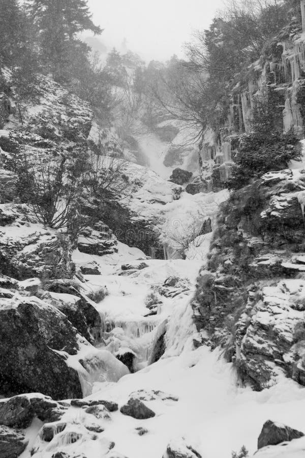 Snow falling on mountain stock photo. Image of icicles - 7556374