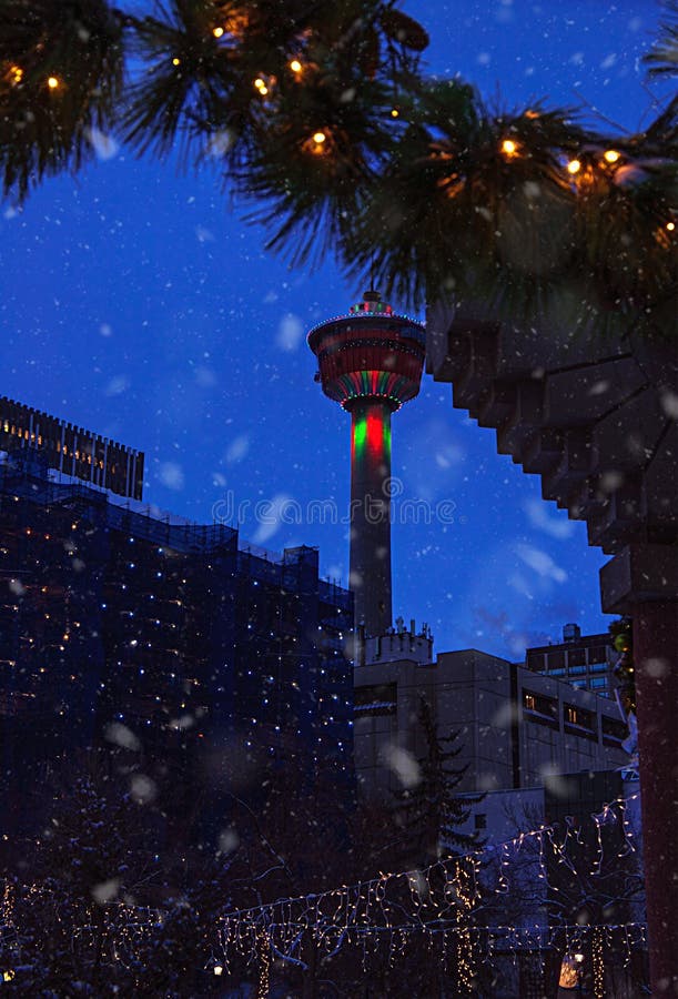 Snow Falling Over the Calgary Tower at Night Stock Photo - Image of ...