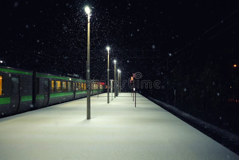 Snow Falling on the Train Station. Stock Photo - Image of railroad ...