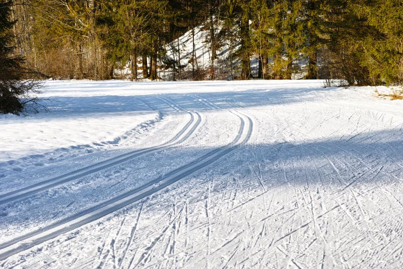 White Snow Field with Ski Trails Winter Season Patterns Stock Image ...