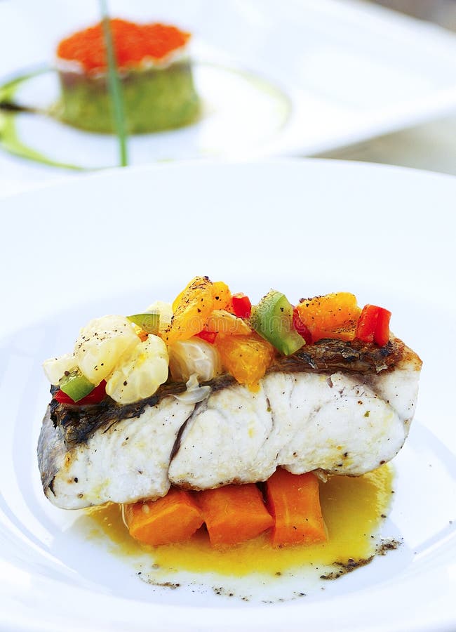Snow fish with carrot stock photo. Image of barramundi - 24652836