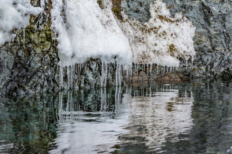 Snow Flows into Icicles on Winter Day Stock Photo - Image of side ...
