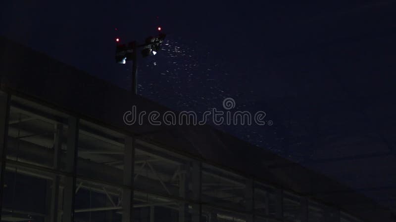 Snow is Flying in Front of the Light at Night Stock Video - Video of ...