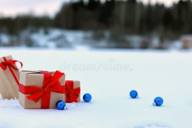 On the Snow Gift Box Ball Landscape Stock Photo - Image of holiday ...